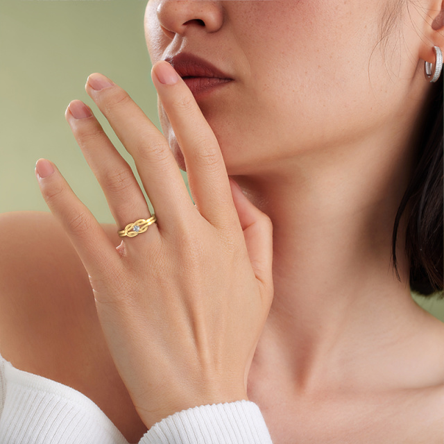 Knoop Keltisch ring goud met 0.10 crt diamant Marina| DiamondsByMe