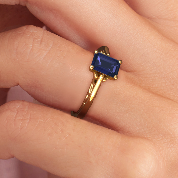 Fantasie gouden sierlijke verlovingsring Shannon eme met saffier