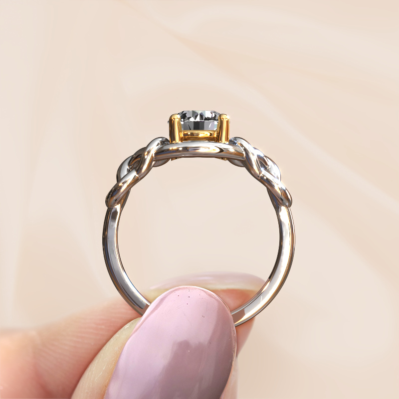 De witgouden Zoe ring is een knoop ring met diamant